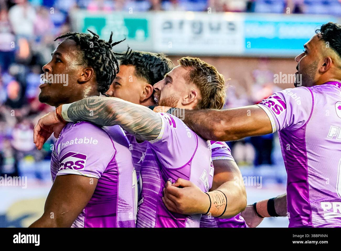 WIGAN, ENGLAND - MAY 16: Junior Nsemba of Wigan Warriors scores a try ...