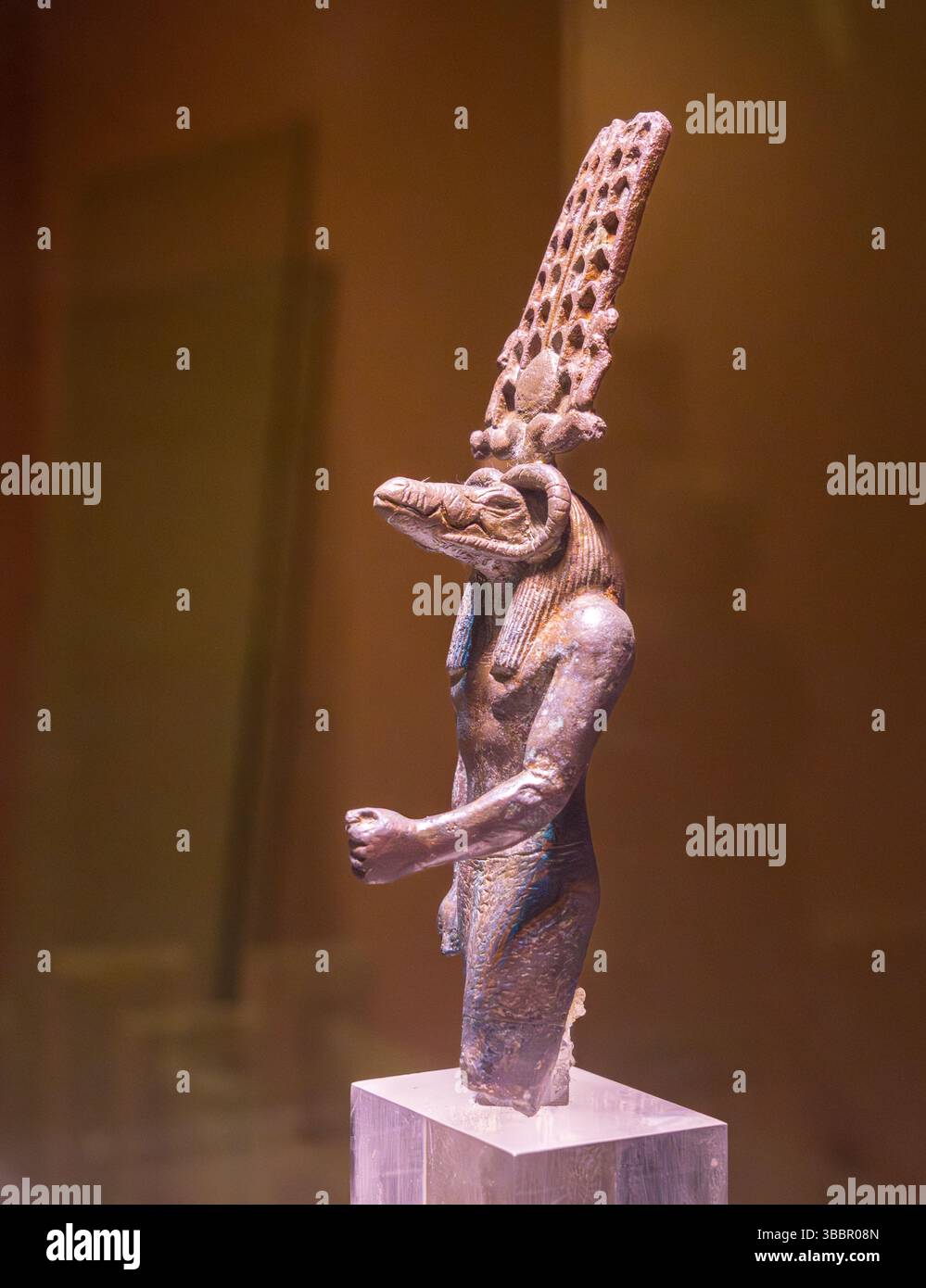 A detailed bronze statue of Sobek, the crocodile-headed god, from Kom ...