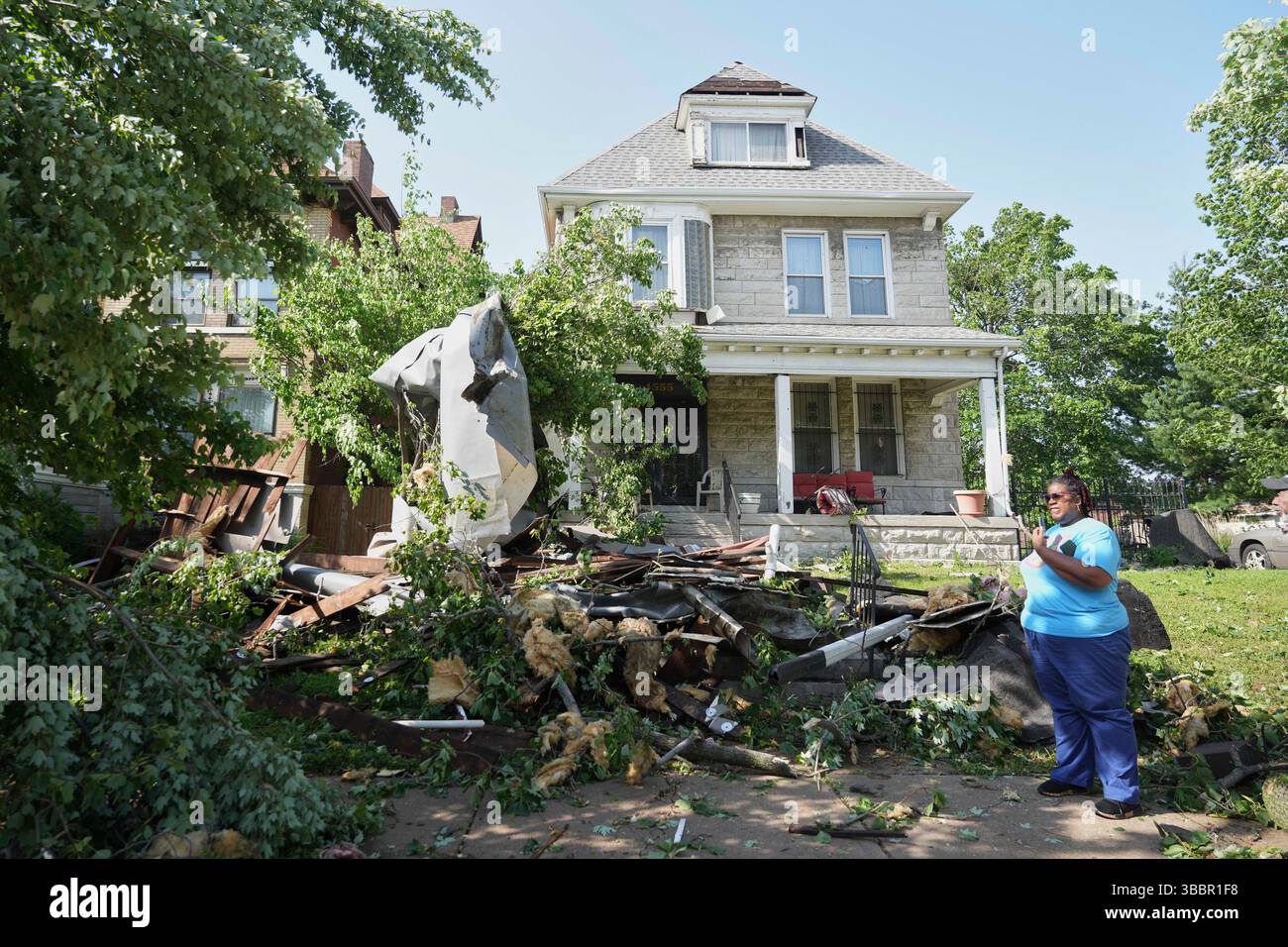 People survey damage after a severe storm moved through Friday, May 16 ...