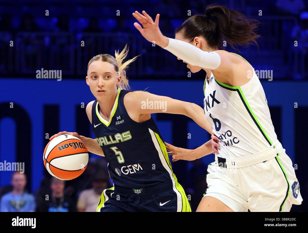 Dallas Wings' Paige Bueckers (5) works against Minnesota Lynx forward ...