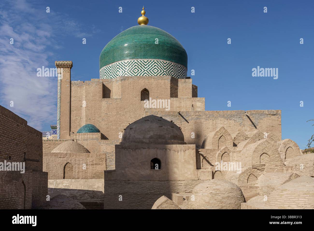 The largest turquoise dome and sandy brickwork define the Pahlavan ...