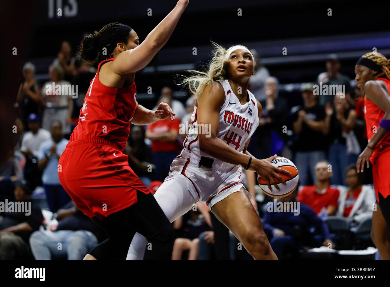 Washington Mystics forward Kiki Iriafen (44) controls the ball against ...