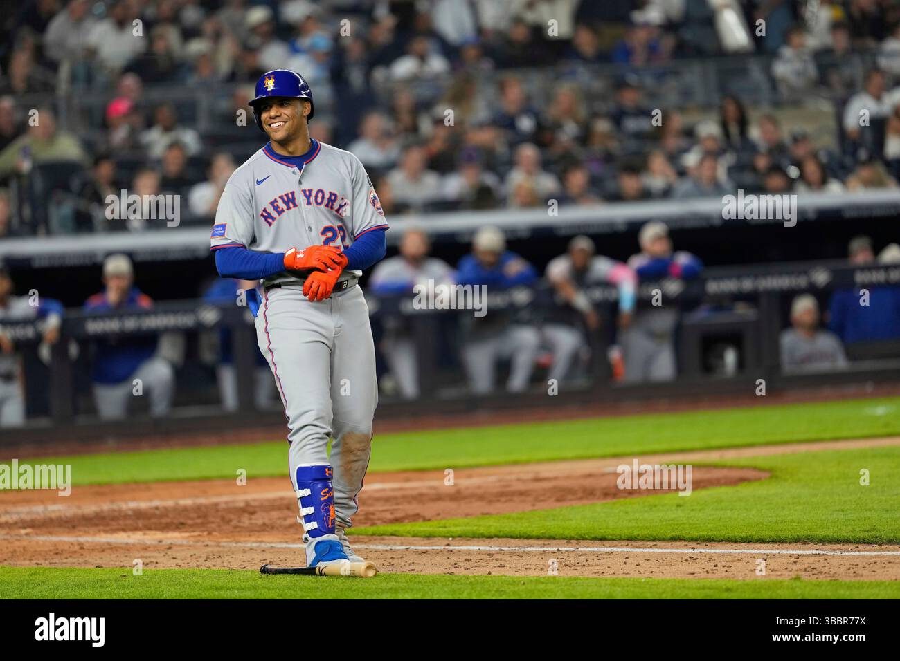 New York Mets' Juan Soto smiles after being walked during the fifth ...