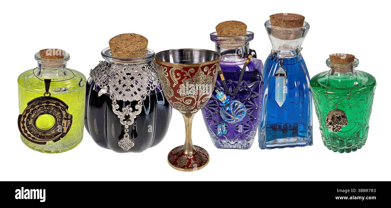 Luck potions with charms and chalice Stock Photo - Alamy