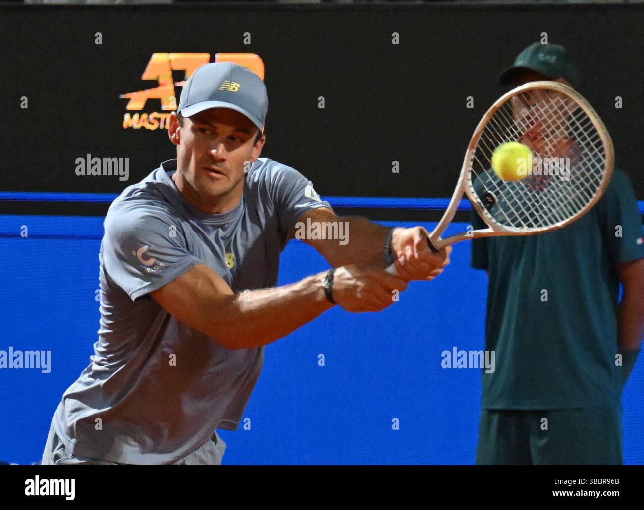 Rome, Italy. 16th May, 2025. Tommy Paul returns a shot during the men's ...