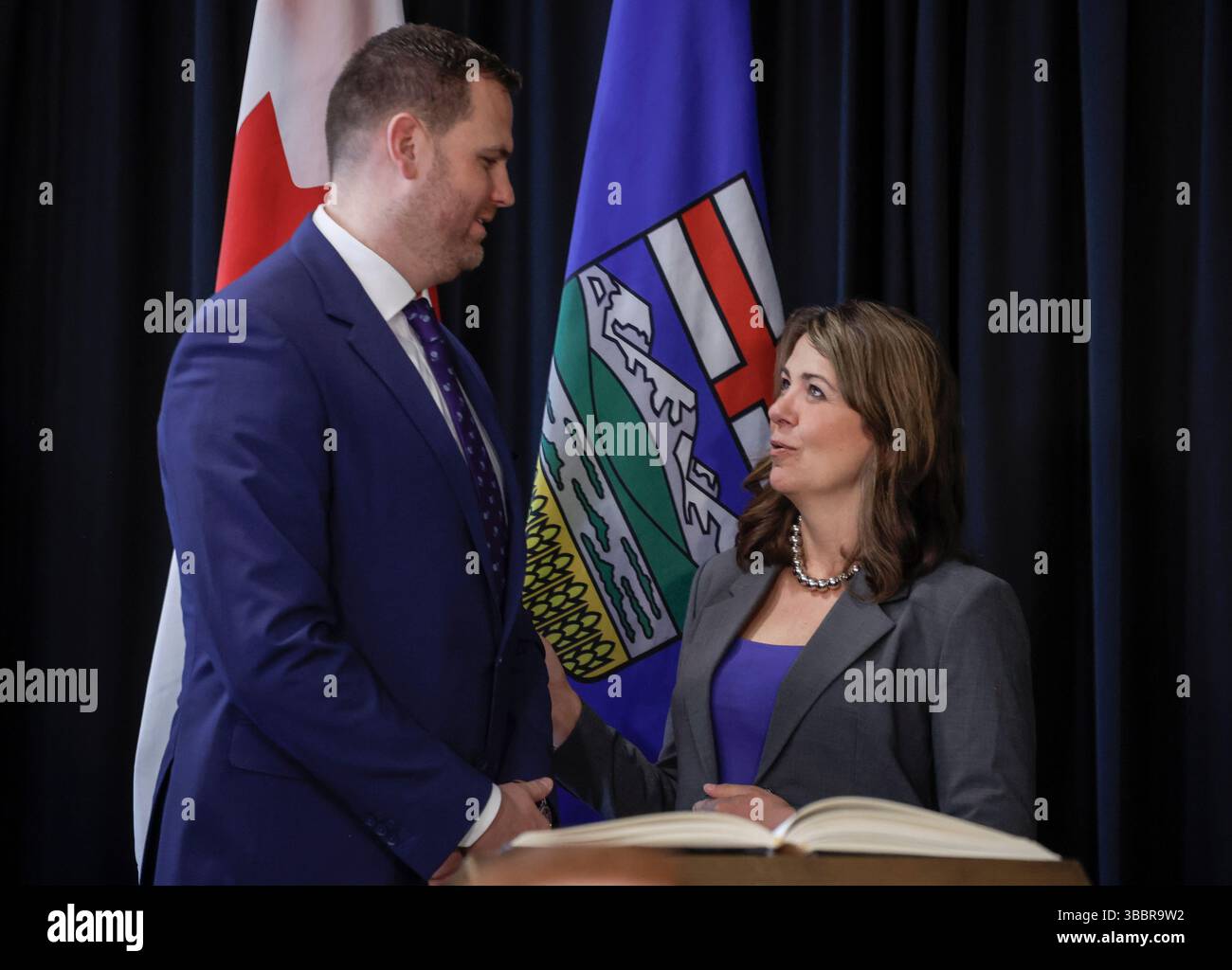 Calgary, Canada. 16th May, 2025. Alberta Premier Danielle Smith, right ...