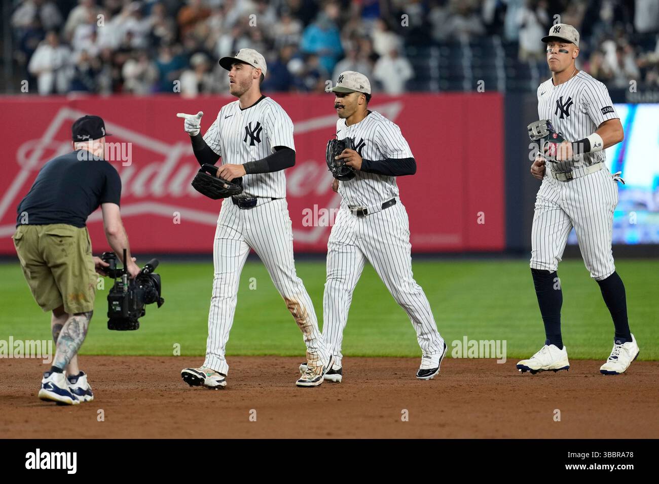 New York Yankees outfielders Cody Bellinger, second from left, Trent ...