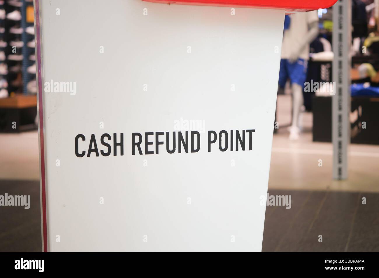 Cash refund point for returns in a retail store Stock Photo - Alamy
