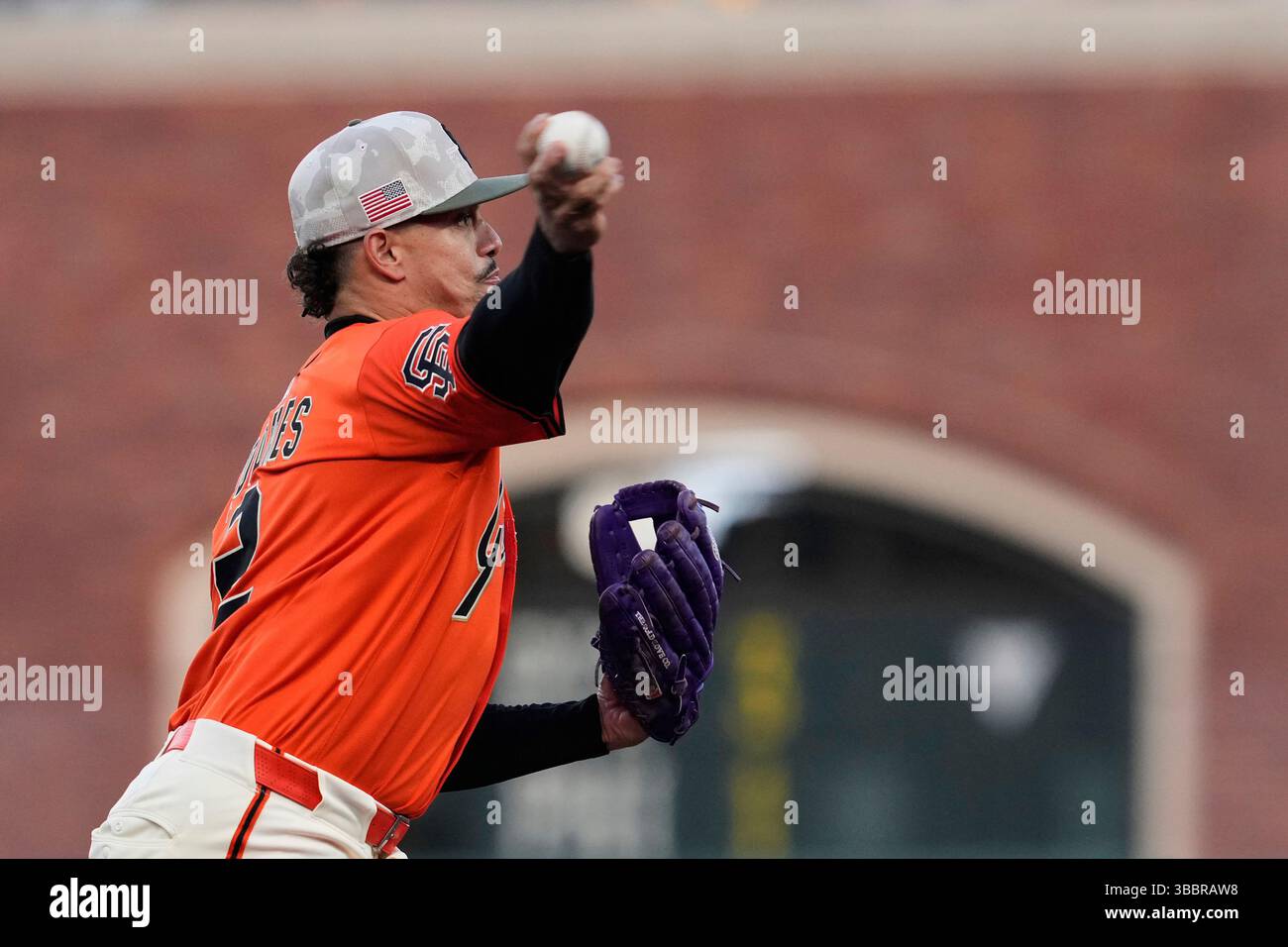 San Francisco Giants shortstop Willy Adames throws to first for an out ...