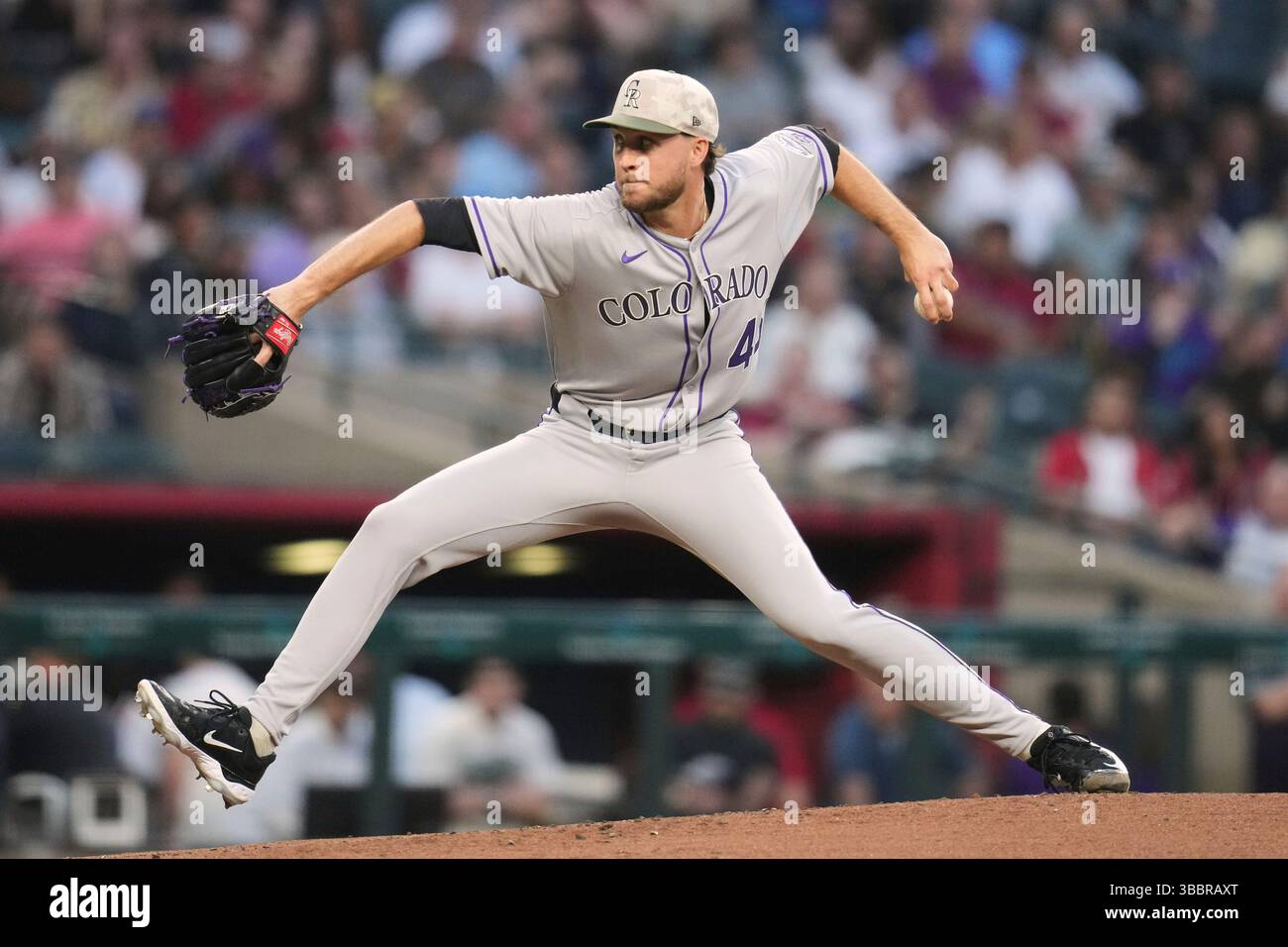 Colorado Rockies starting pitcher Carson Palmquist throws against the ...