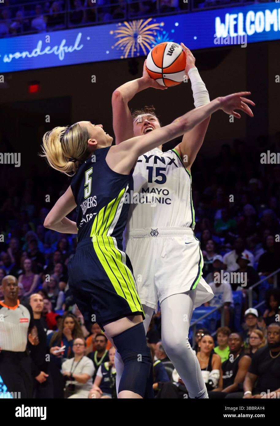Dallas Wings guard Paige Bueckers (5) fouls Minnesota Lynx forward ...