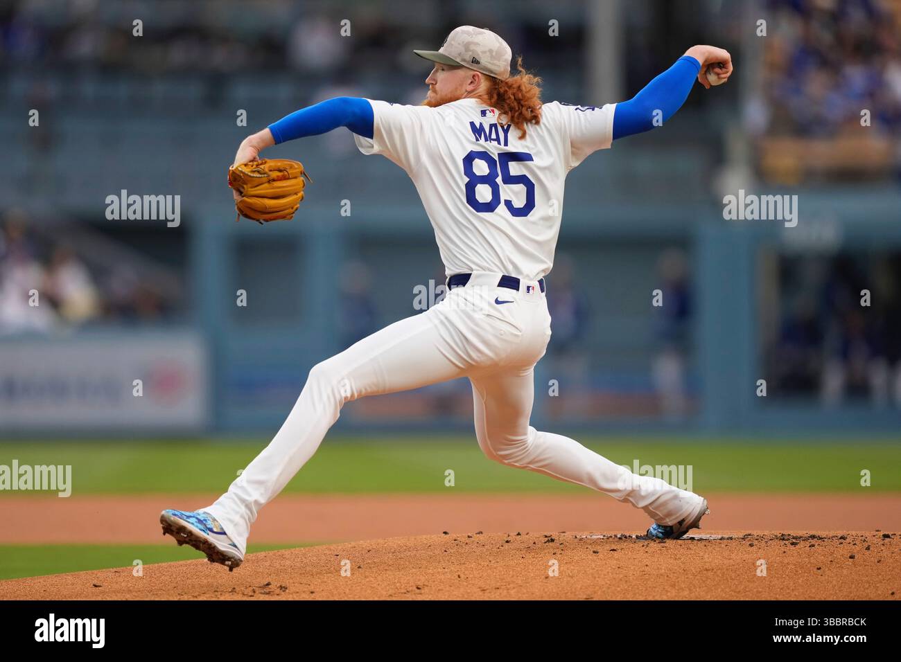 Los Angeles Dodgers starting pitcher Dustin May throws to the plate ...