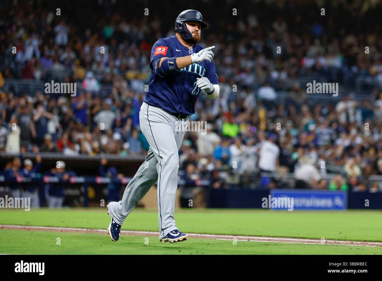 Seattle Mariners' Rowdy Tellez runs the bases after his two-run home ...
