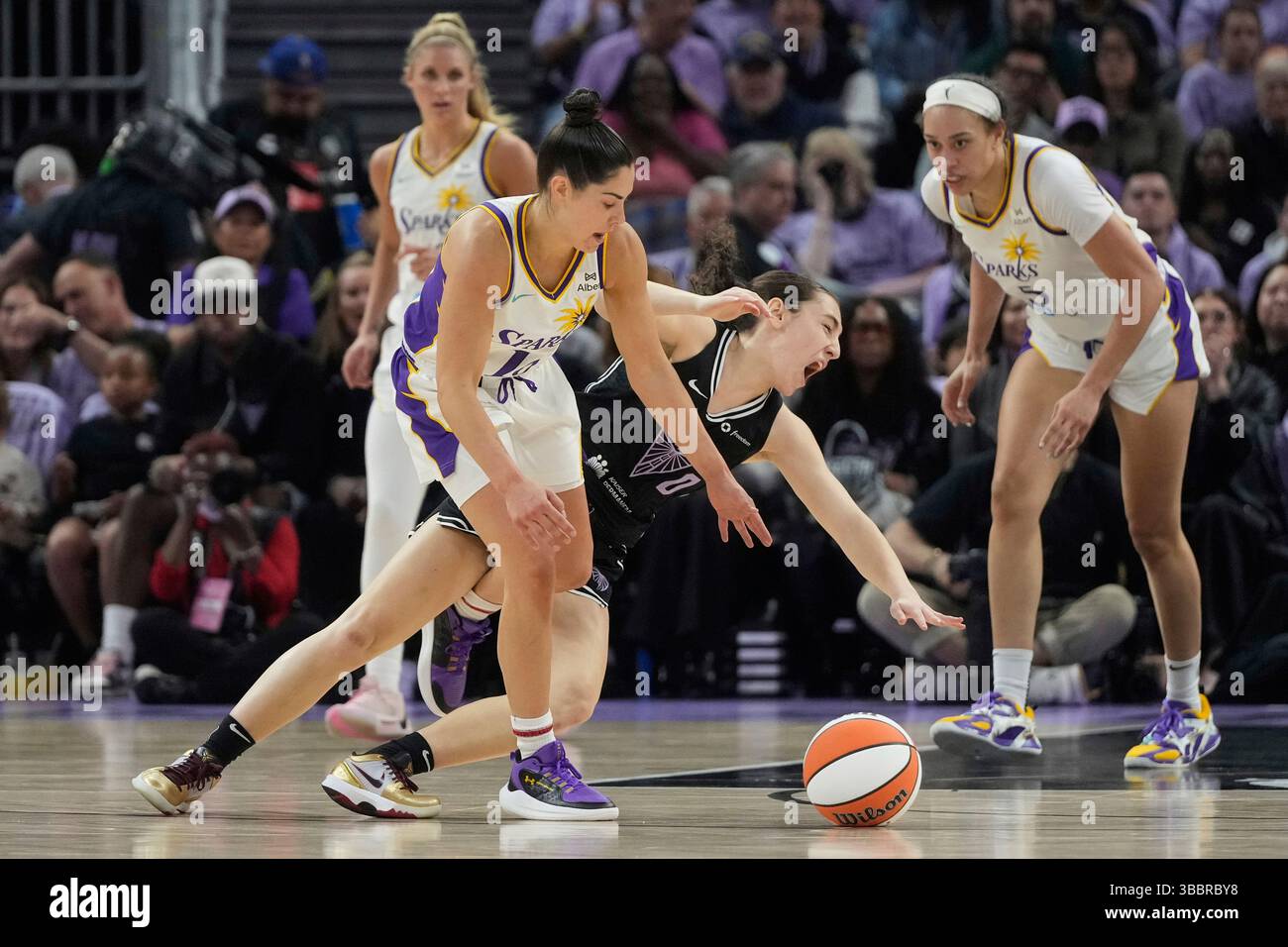 Los Angeles Sparks guard Kelsey Plum, foreground left, fouls Golden ...