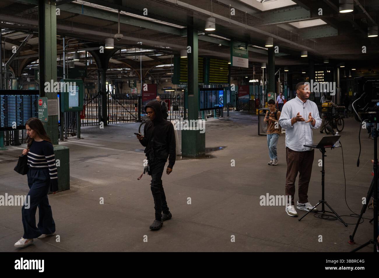 Jersey City, United States. 16th May, 2025. A reporter does his piece ...