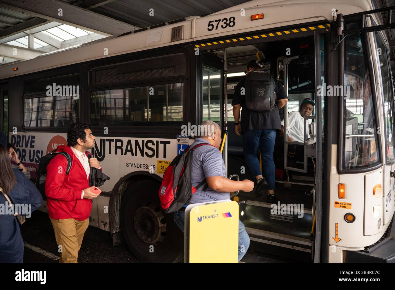 Jersey City, United States. 16th May, 2025. Commuters board their bus ...