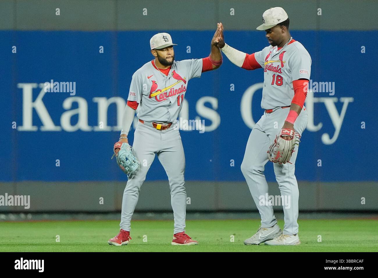 St. Louis Cardinals' Victor Scott II (11) and Jordan Walker (18 ...