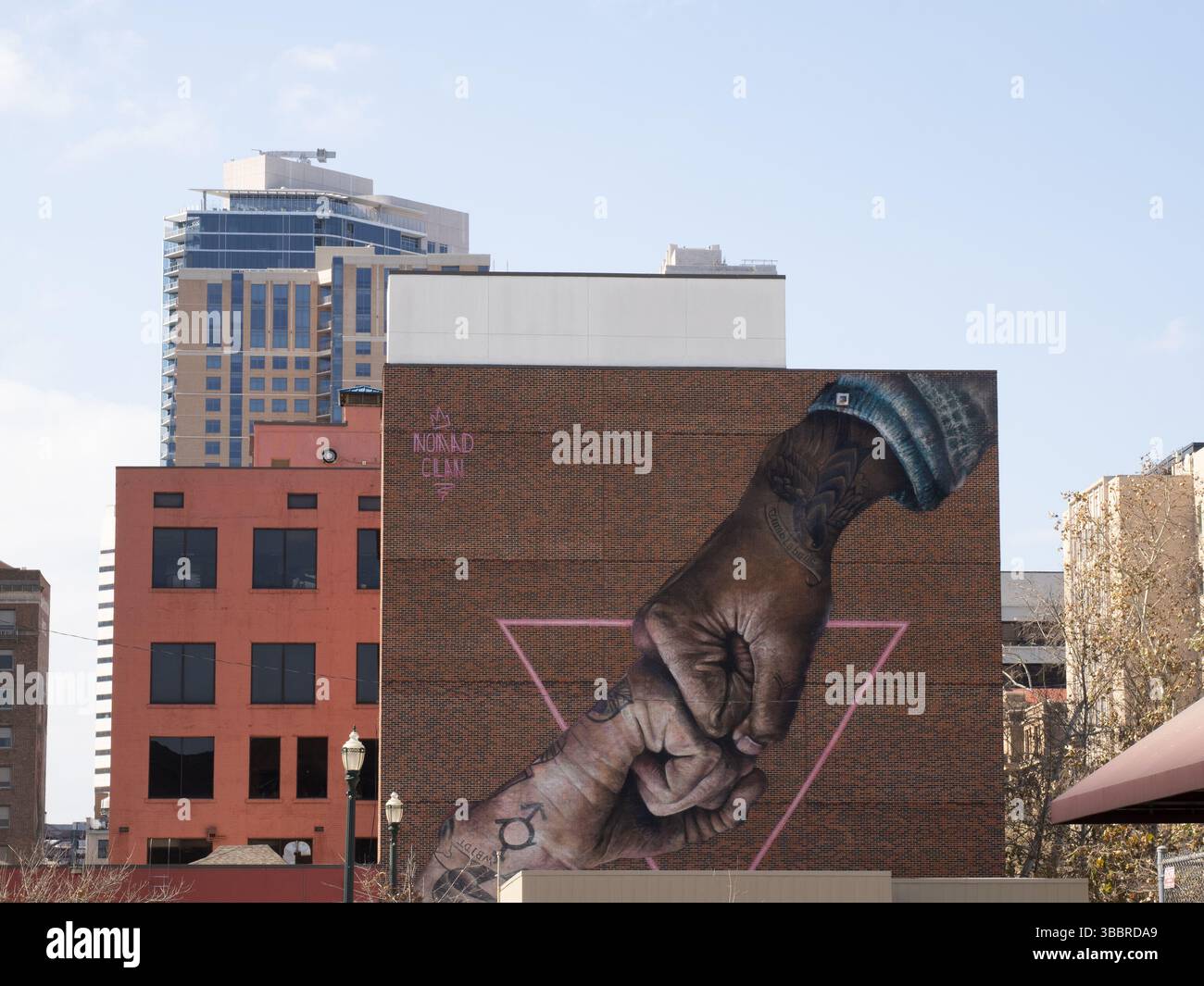 Houston, Texas, Inexorable mural depicting a fist bump with both hands ...