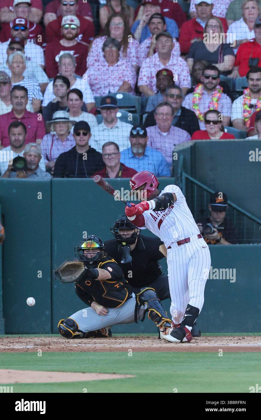 May16, 2025: Justin Thomas Jr. (4) of Arkansas watches the ball come ...