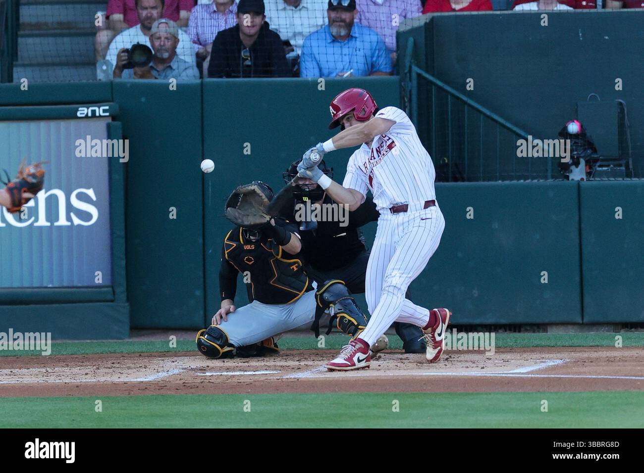May16, 2025: Hogs catcher Ryder Helfrick (27) works to put a ball in ...