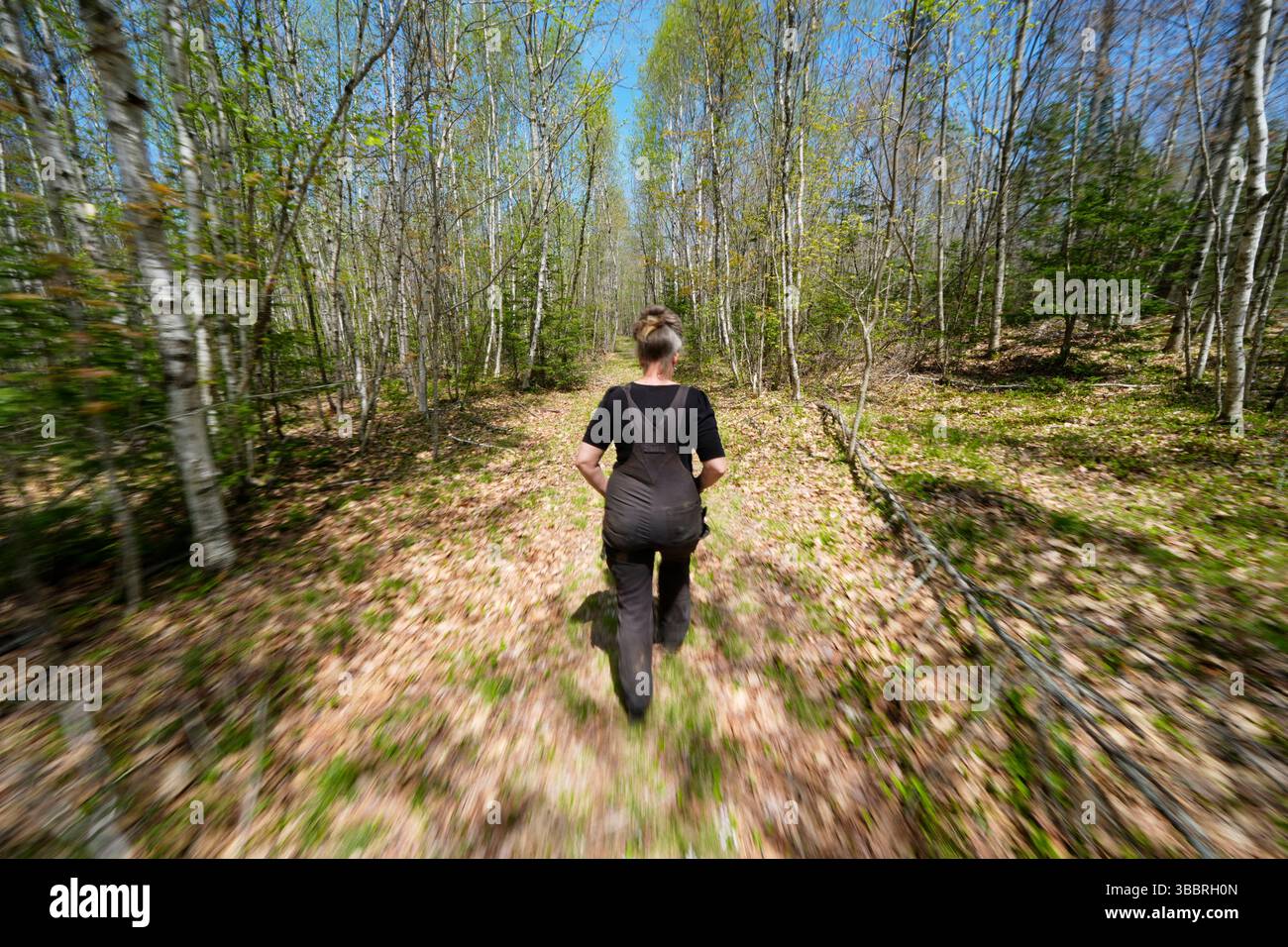 Heather Donahue walks on a rural road, Tuesday, May 13, 2025, in ...