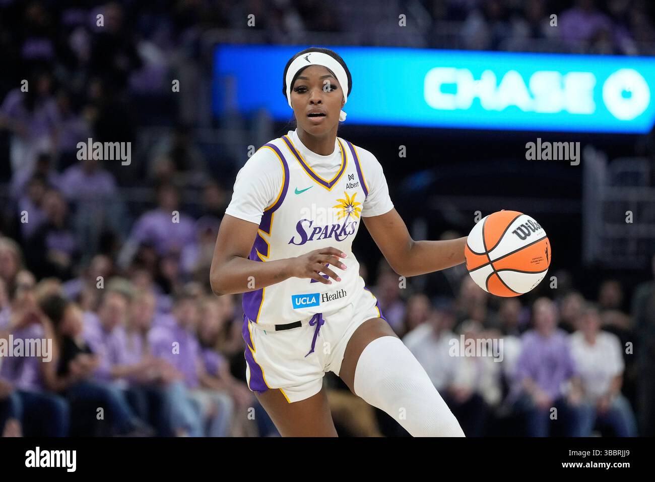 Los Angeles Sparks forward Rickea Jackson brings the ball up the court ...