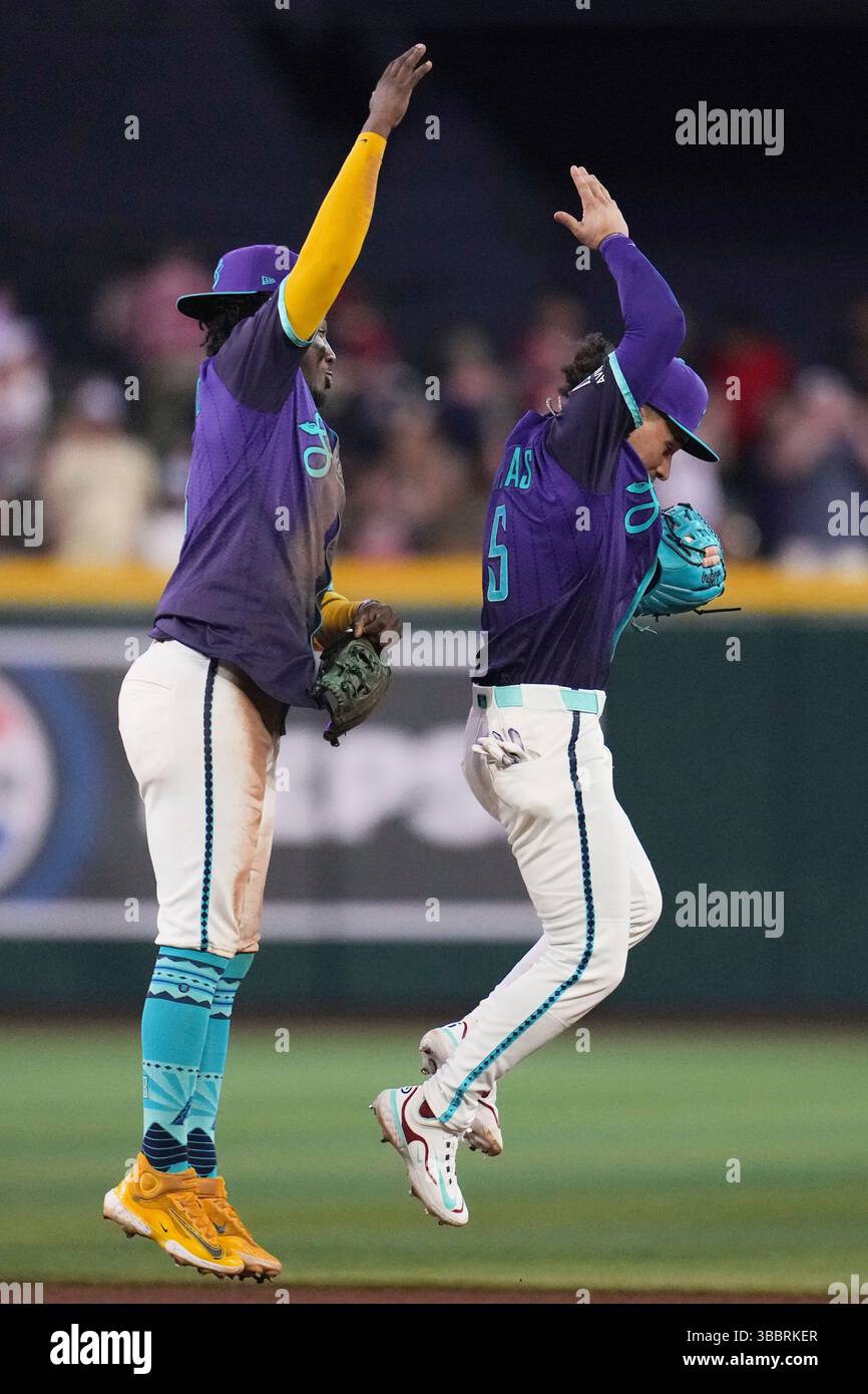 Arizona Diamondbacks' Alek Thomas (5) and Geraldo Perdomo celebrate a ...