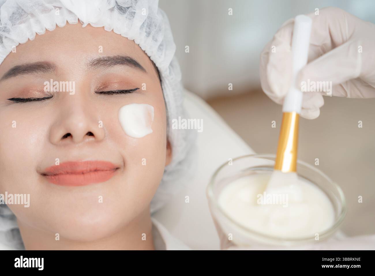 Beautiful woman receive spa and treatment skin of face. face of a ...