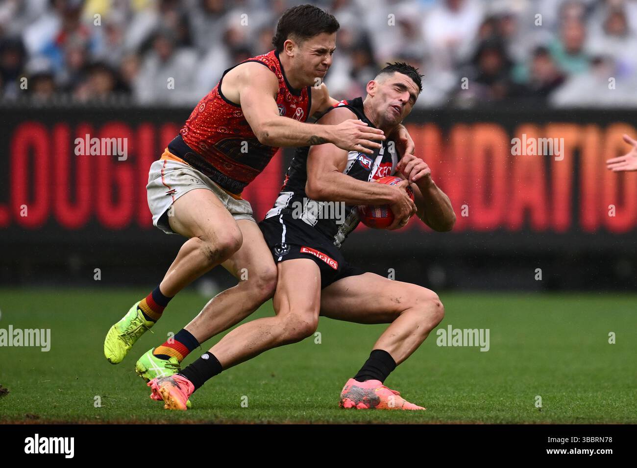 Melbourne, Australia. 17th May, 2025. Jake Soligo of the Crows tackles ...