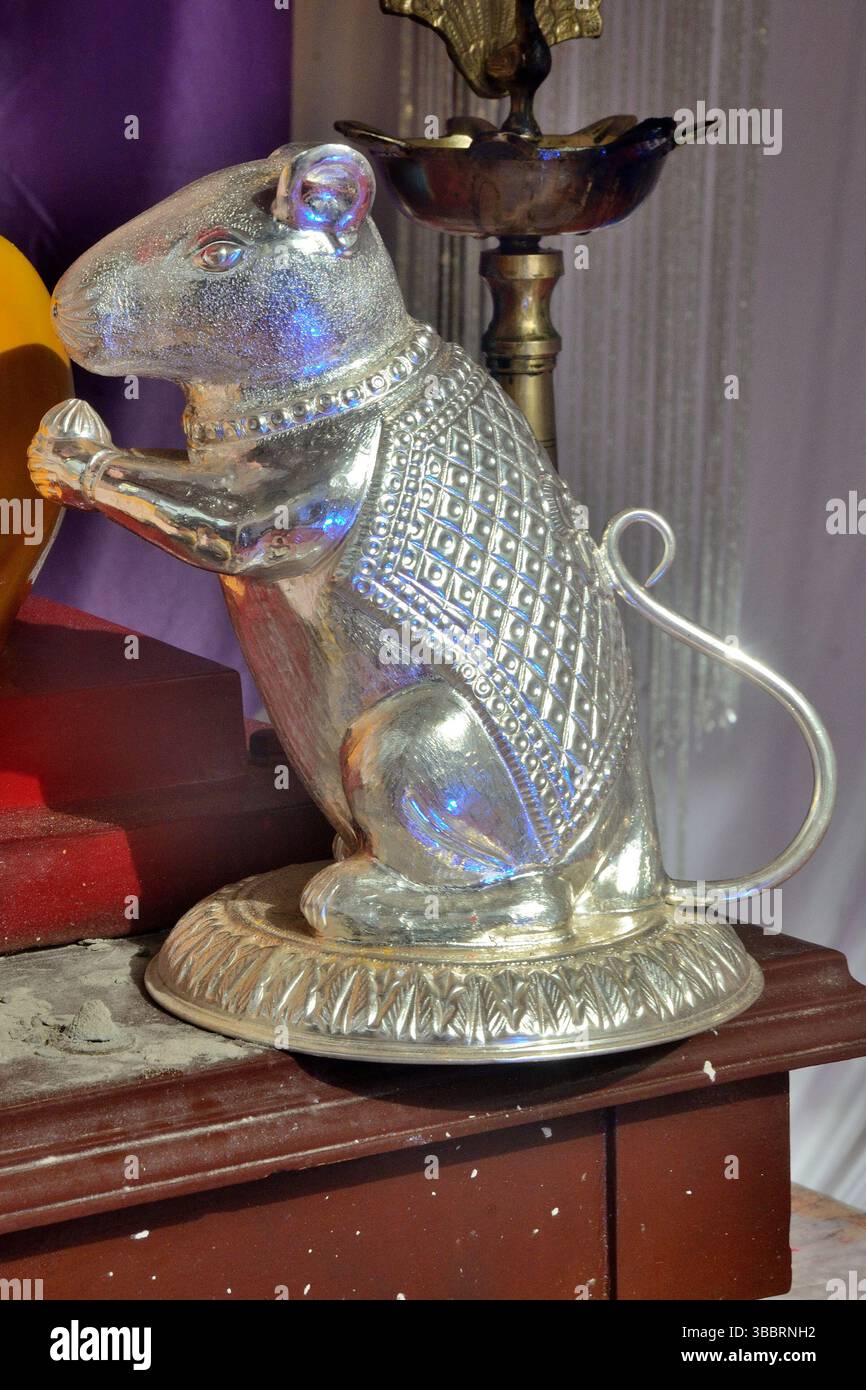 Silver colored idol of a mouse, vaahan (vehicle) of The Lord Ganesha ...