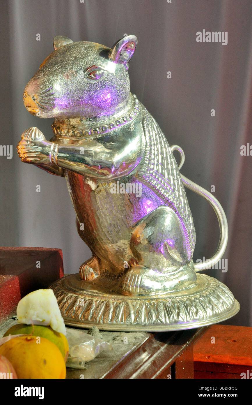 Silver colored idol of a mouse, vaahan (vehicle) of The Lord Ganesha ...