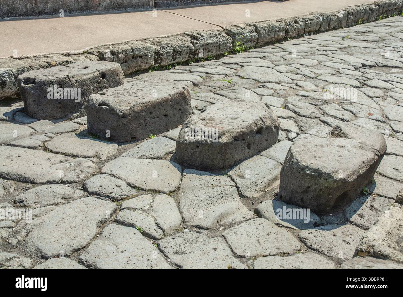 Stepping stones above perpetually flowing water needed to cross streets ...