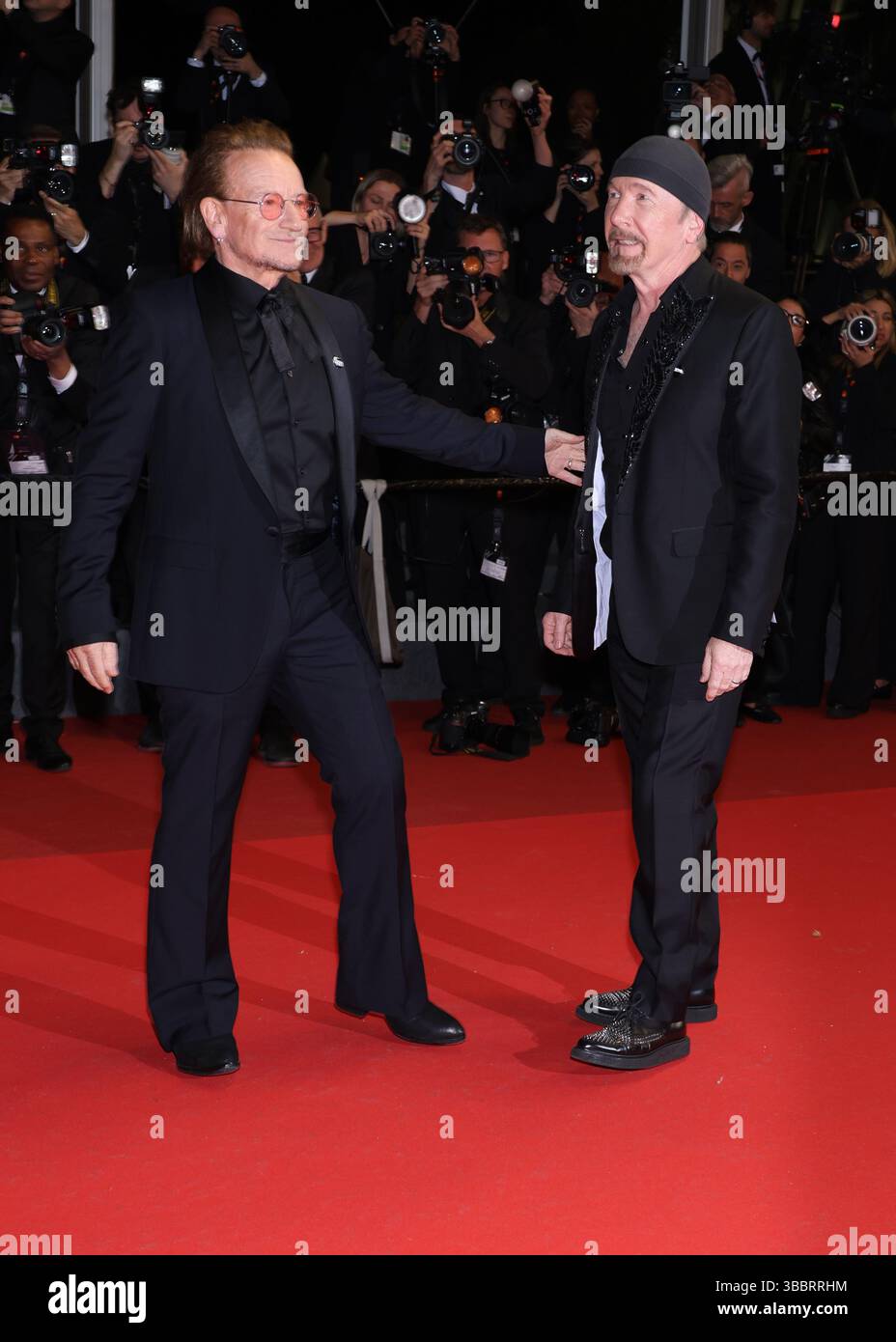 Cannes, France. 16th May, 2025. Bono and The Edge of U2 attend the ...