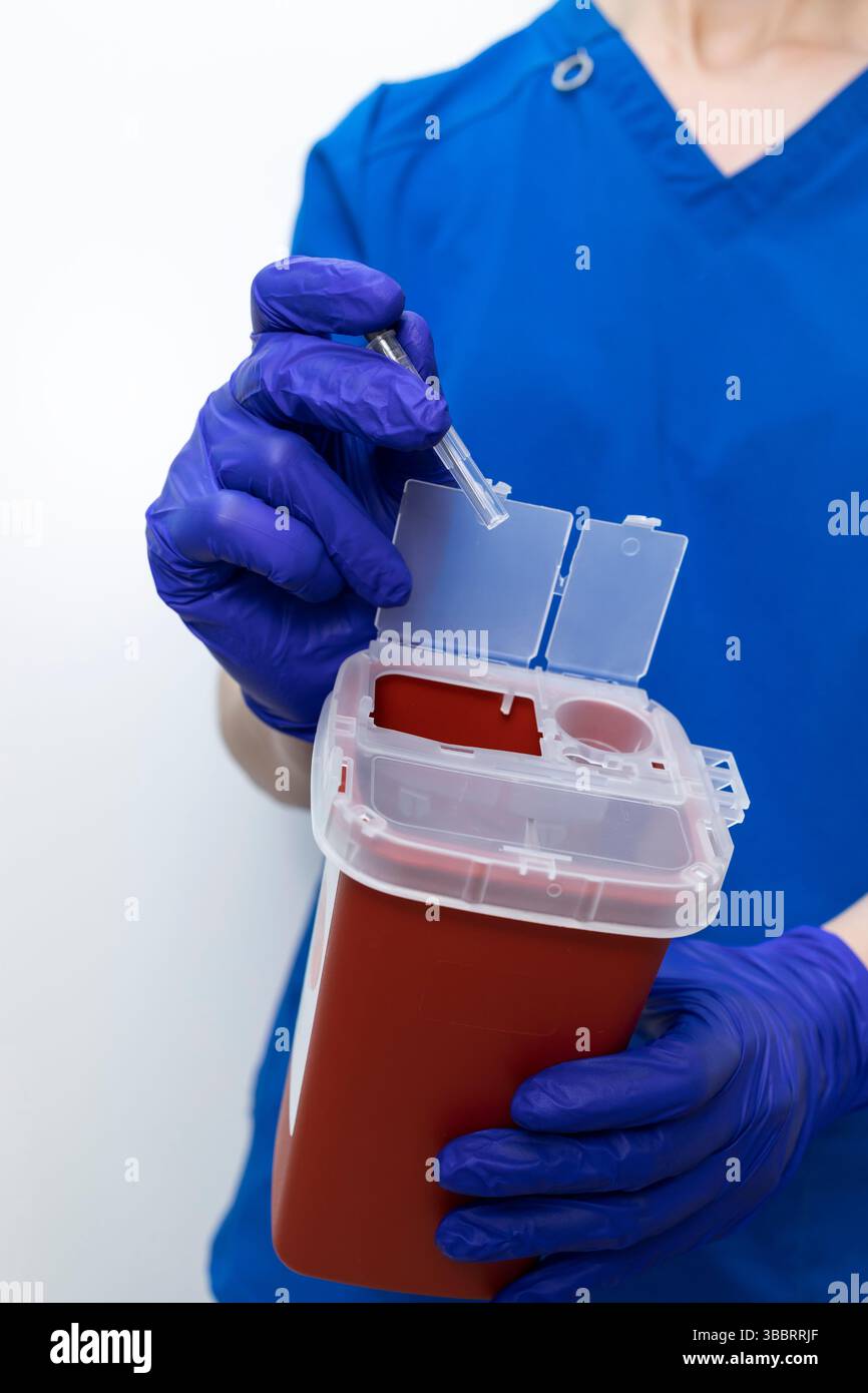 Doctor Disposes Needle, Ampule In Sharps Container. Disposal Container ...