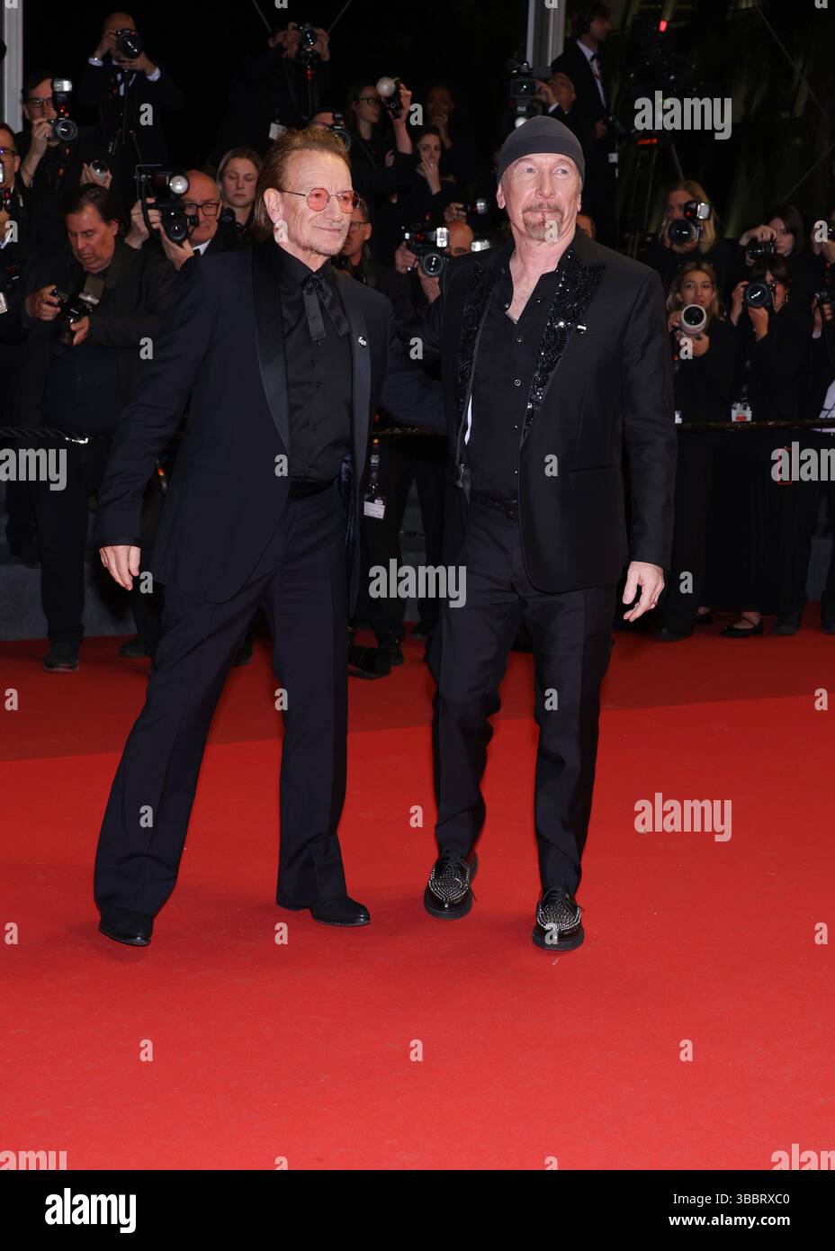 Cannes, France. 16th May, 2025. Bono and The Edge of U2 attend the ...