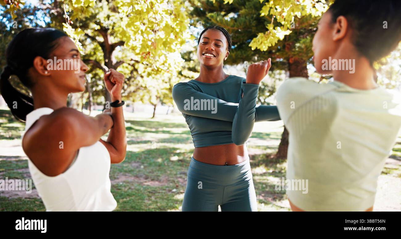 Park, fitness and group of women stretching outdoor with friendship ...