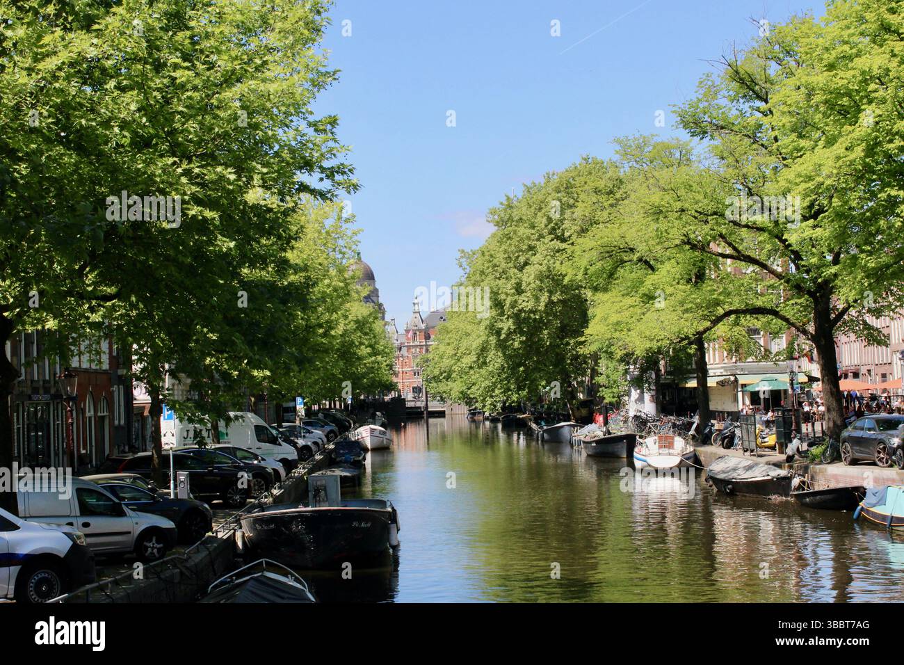 amsterdam the netherlands- canal traffic with barges and boats Stock ...