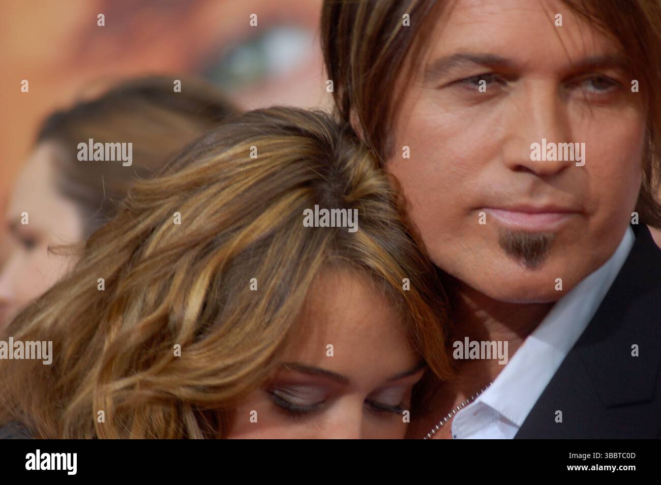 Miley Cyrus and her father, Billy Ray Cyrus, share a family moment on ...