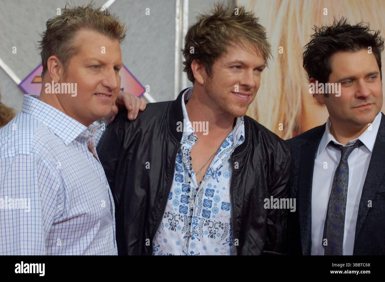 Country music trio Rascal Flatts attends the premiere of Hannah Montana ...