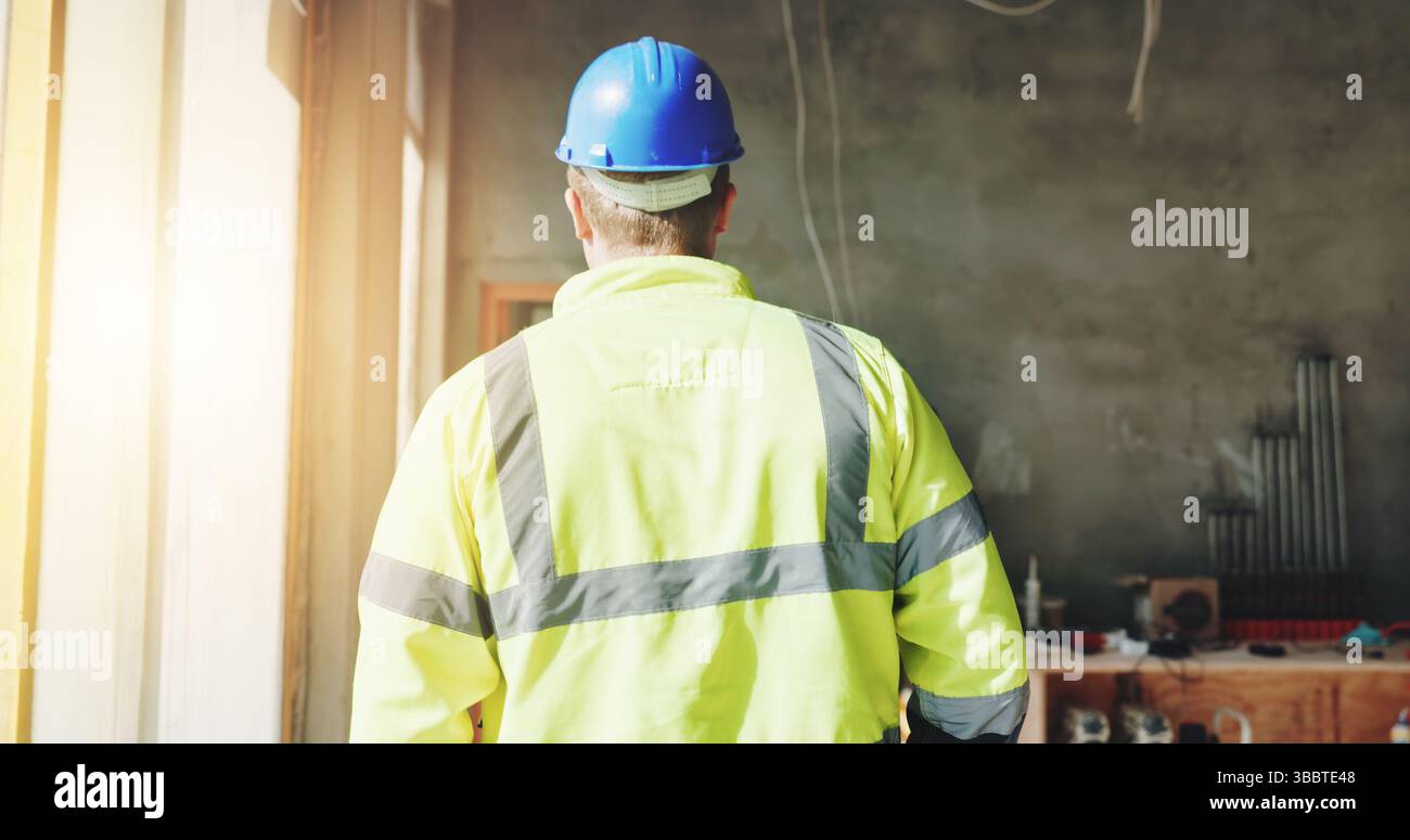 Construction, walking and man with back on site for building inspection ...