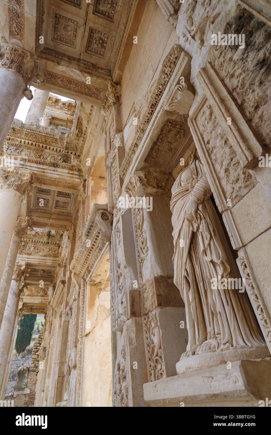 Headless statue in the Library of Celsus in ancient city of Ephesus ...