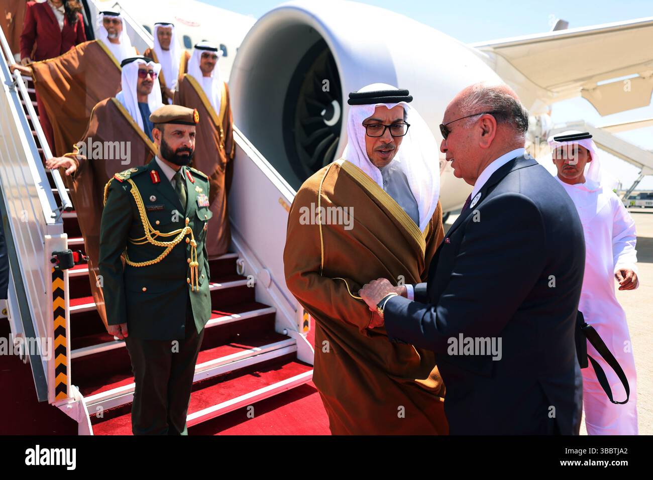 Iraq's Foreign Minister Fuad Hussein, right, welcomes Emirati Vice President and Deputy Prime ...