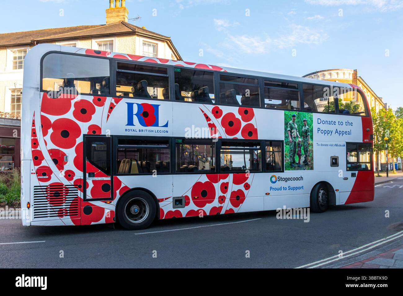 Double decker bus with poppies, to promote the Royal British Legion ...