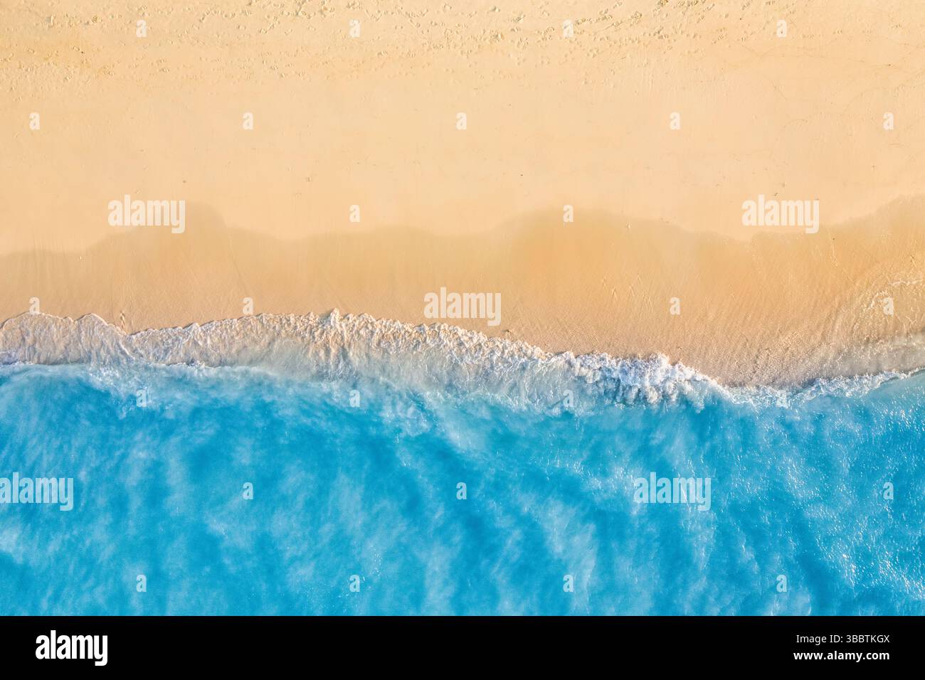 Aerial top view sandy beach shoreline with calm sea waves peaceful ...