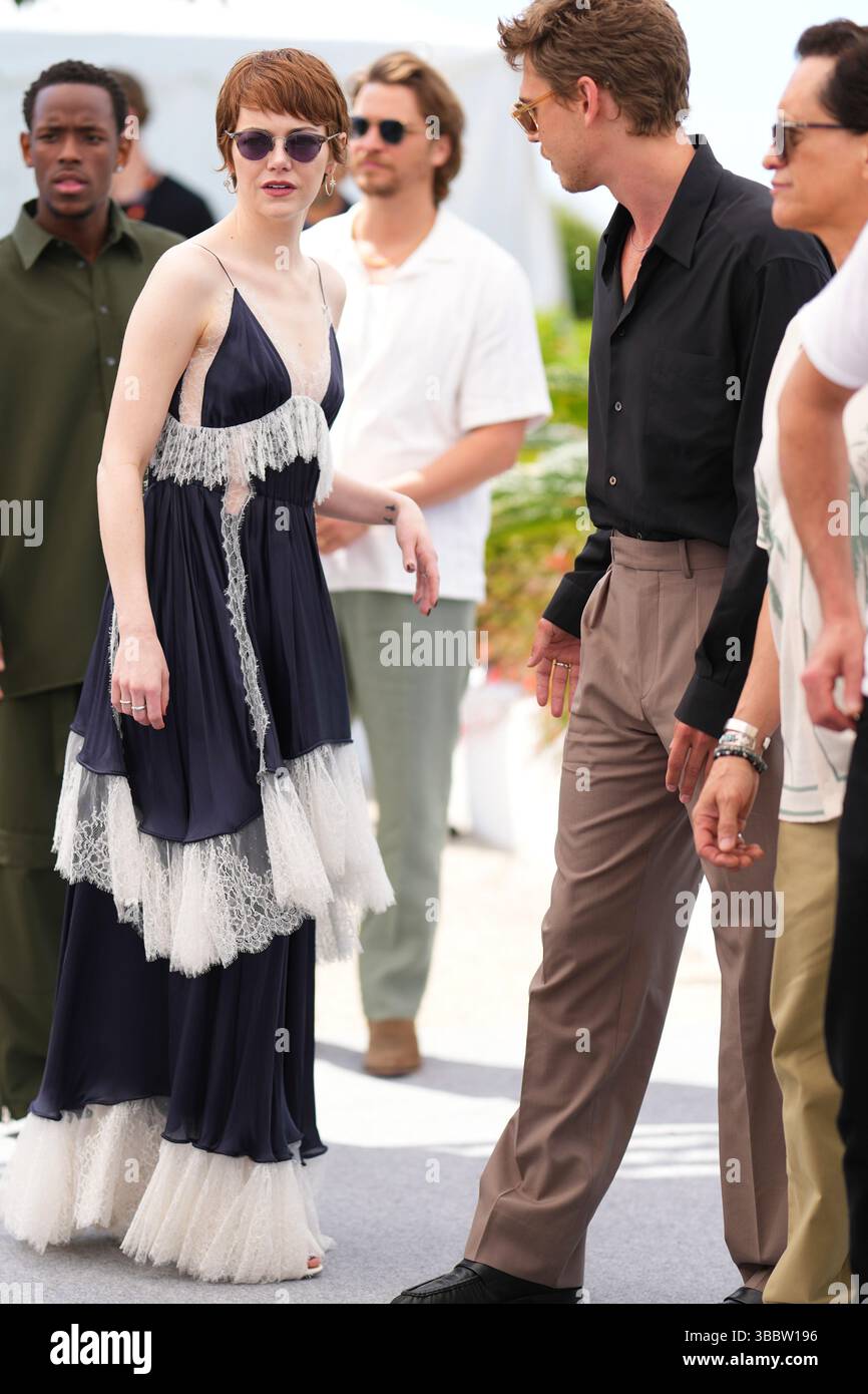 Emma Stone, left, and Austin Butler arrive for the photo call for the ...