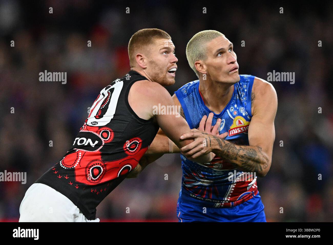 Melbourne, Australia. 17th May, 2025. Peter Wright of Essendon (left ...