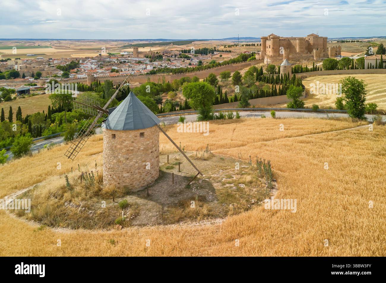 Aerial view of an old windmill near historic Castle of Belmonte in ...