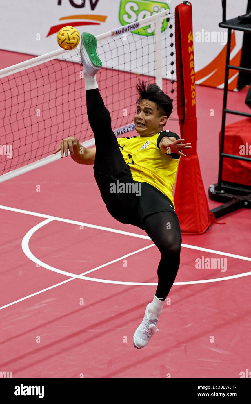 KUALA LUMPUR, KUL - MAY 17: Mohamad Azlan Alias of Malaysia kick the ...