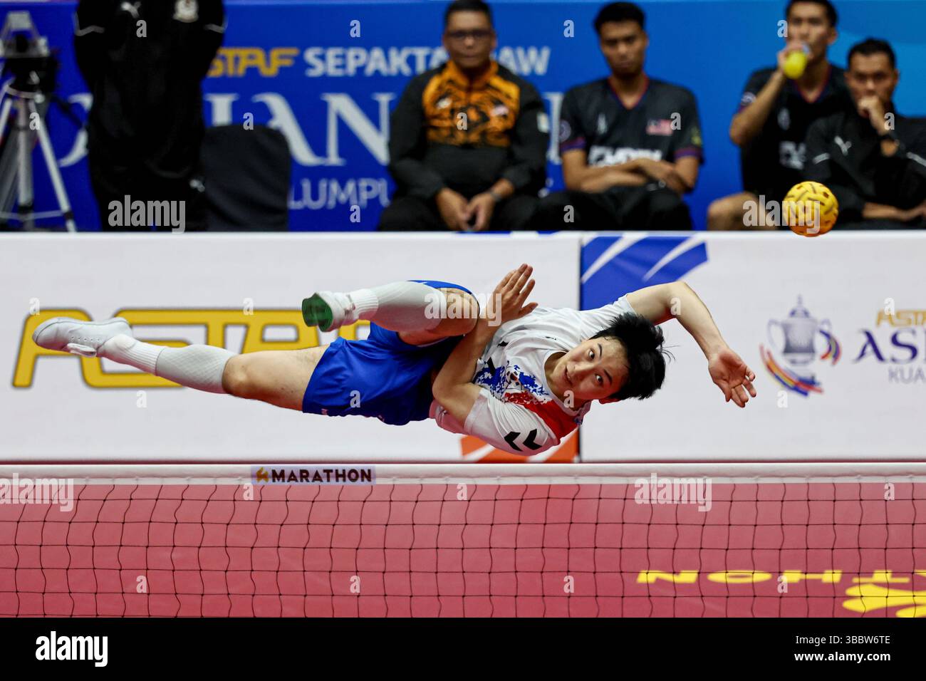 KUALA LUMPUR, KUL - MAY 17: Lee Junuk of Korea kick the ball in the ...