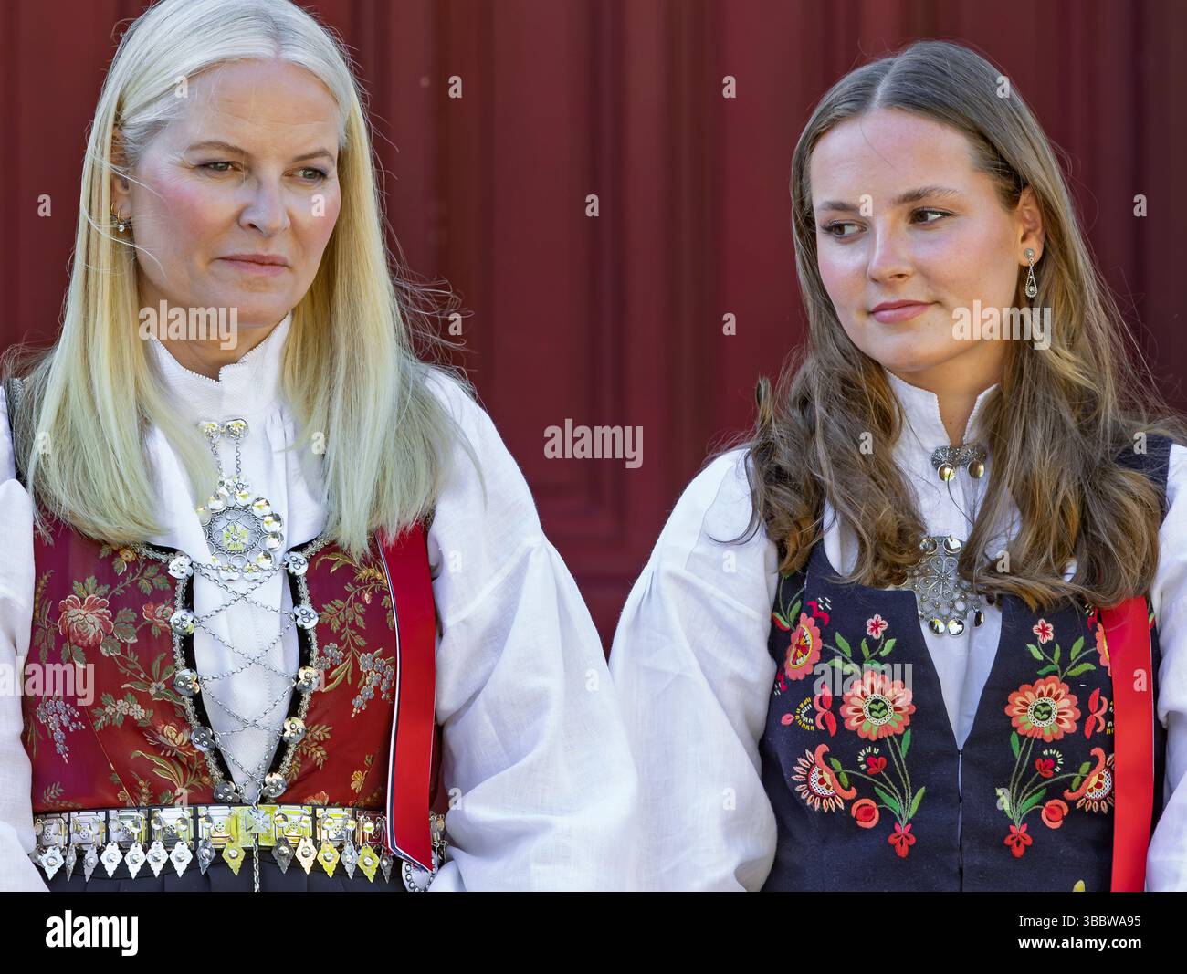 Asker, Norway 17 May 2025 Crown Princess Mette Marit, Crown Princess Ingrid Alexandra greet the ...